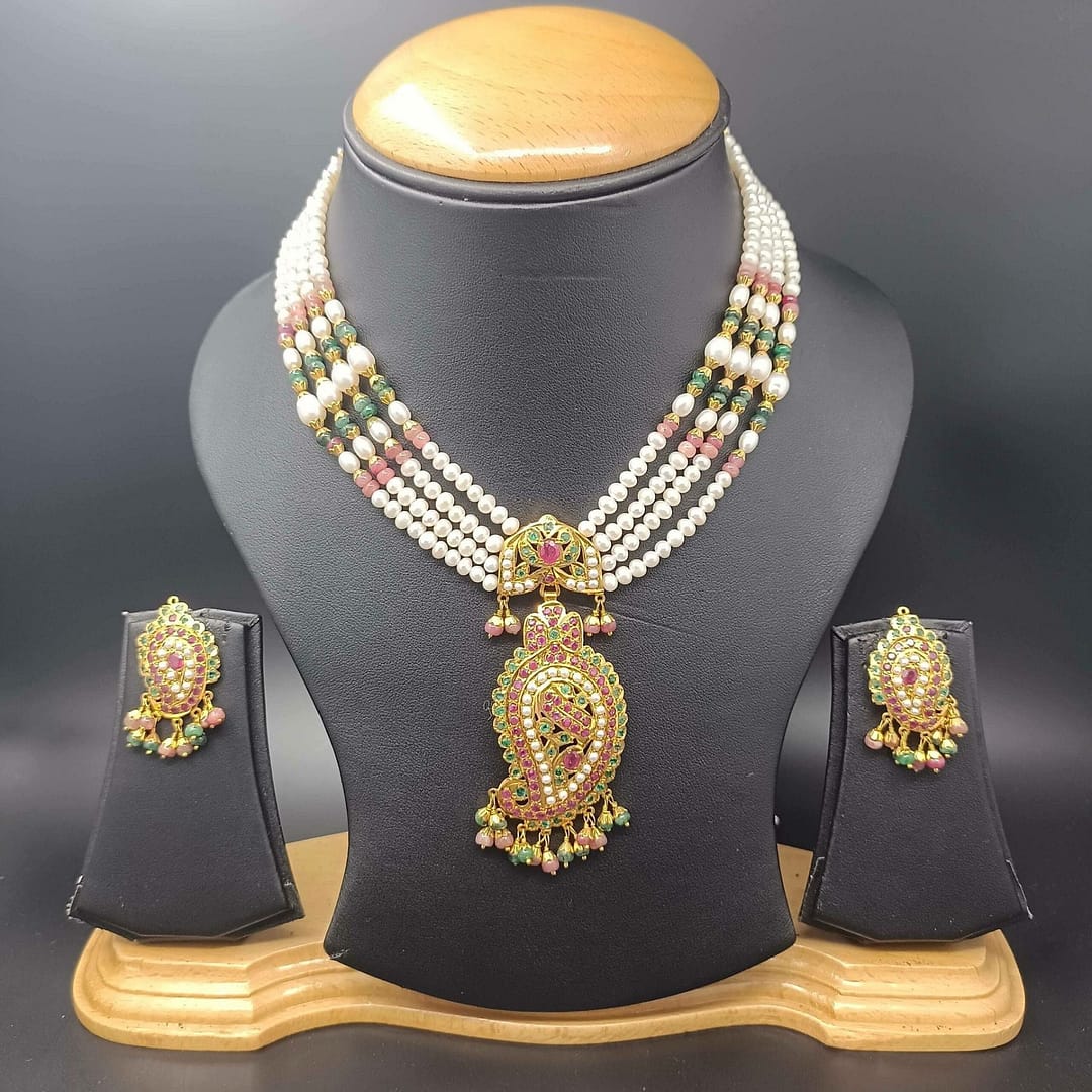 Gold Set Studded with Real Ruby Emeralds and Moti - Storelize